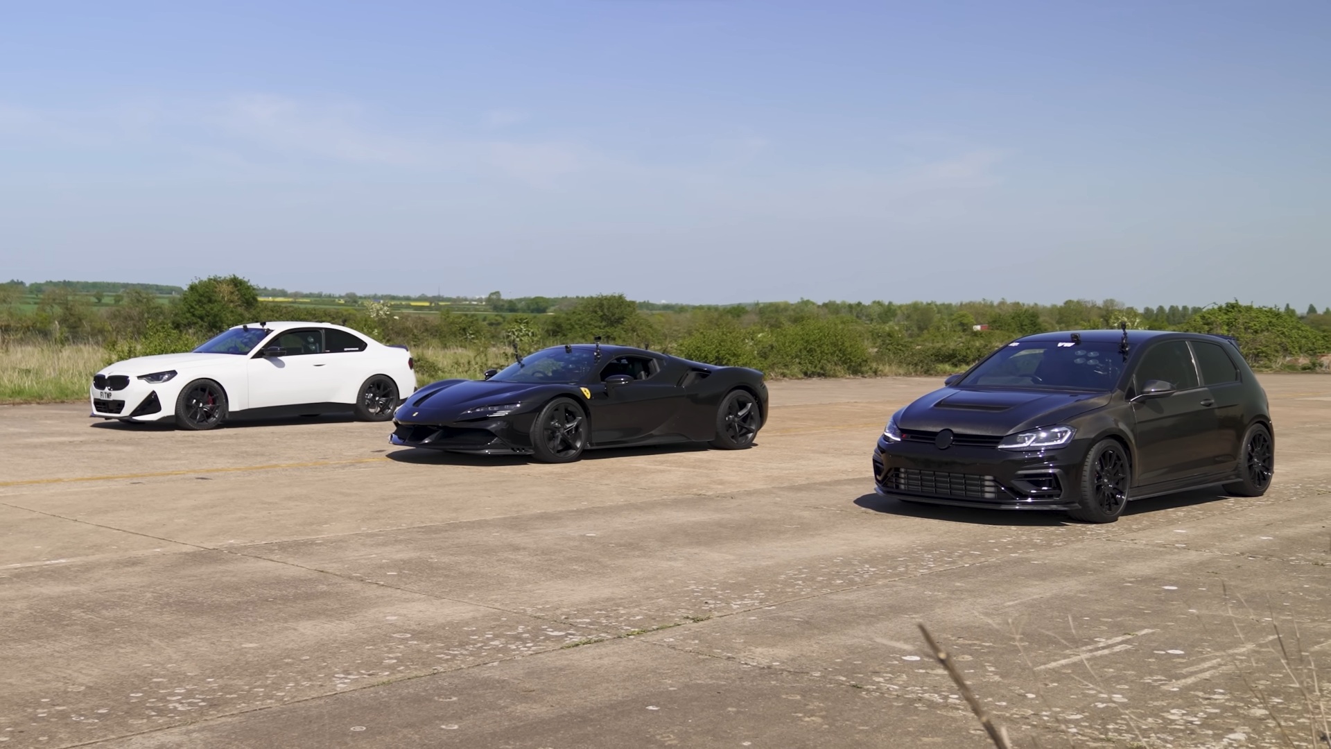 Ferrari SF90 Drag Races a Modified Volkswagen Golf R and BMW M240i